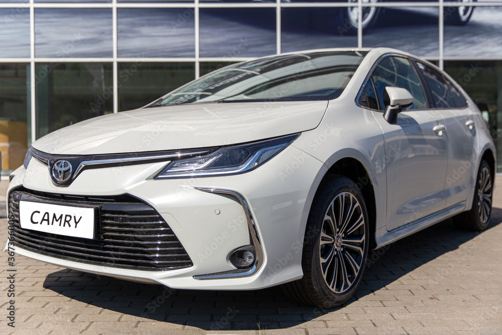 Toyota Camry in front of the motor show closeup Stock Photo | Adobe Stock
