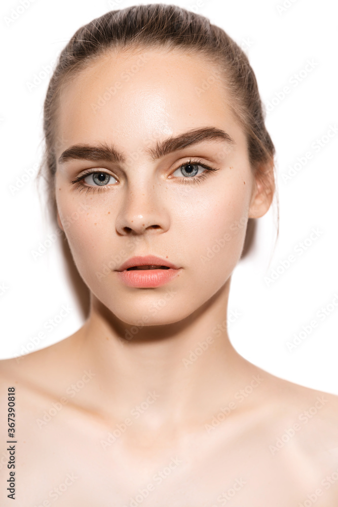 Young woman face portrait with brown hair, clean skin and beautiful ...