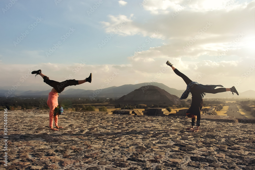 Two girls doing stunts in the Teotihuacan pyramids. Girls doing stunts ...