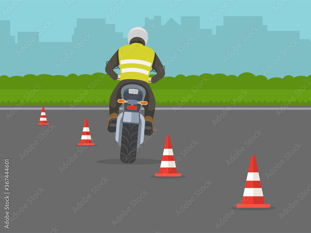 Motorcycle driving lesson. Learner motorcyclist practising to turn ...