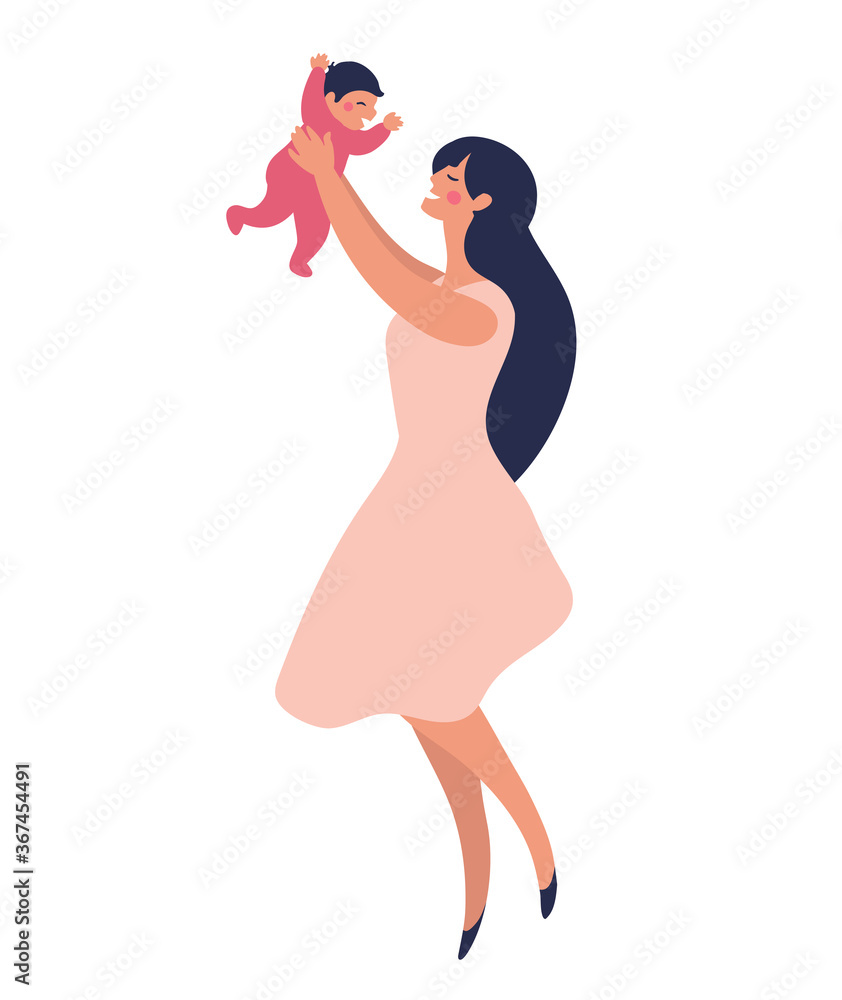 A young mother stands and plays with her child in her arms. Happy mom ...