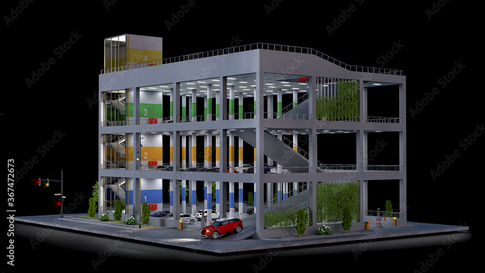 Illuminated multi-level parking building on a piece of ground at night ...