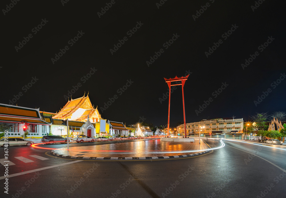 The Giant Swing or Sao Ching Cha monument with Wat Suthat temple at ...