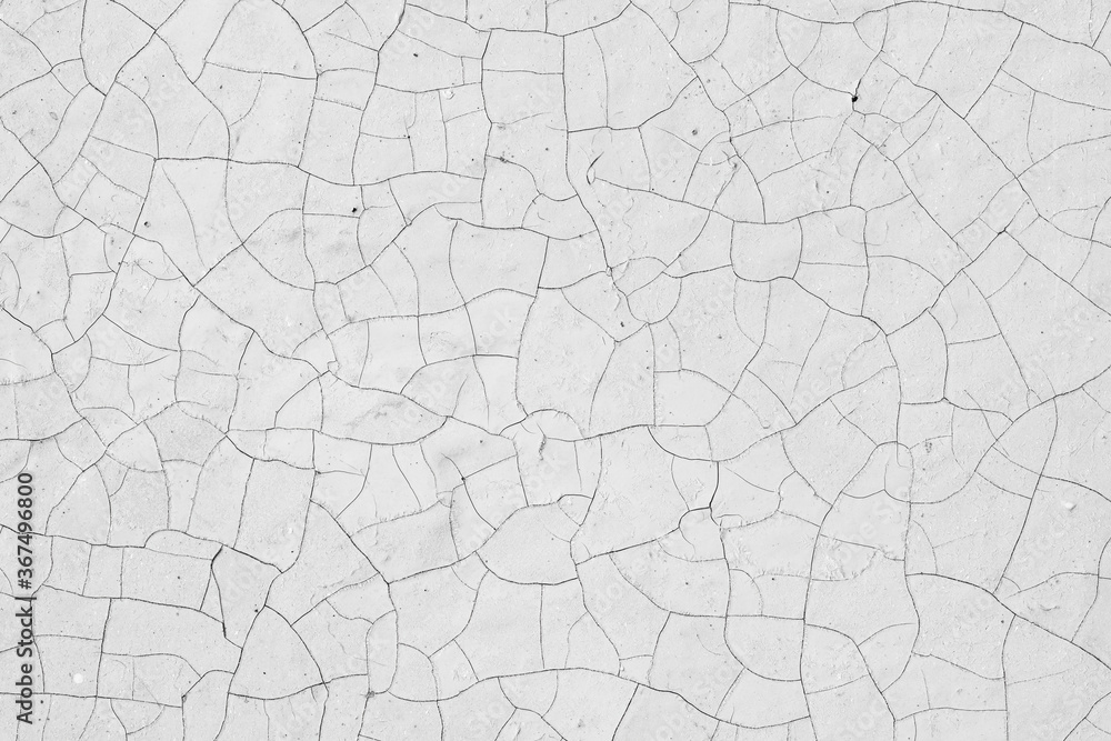 White peeling paint on the wall. Old concrete wall with cracked flaking ...