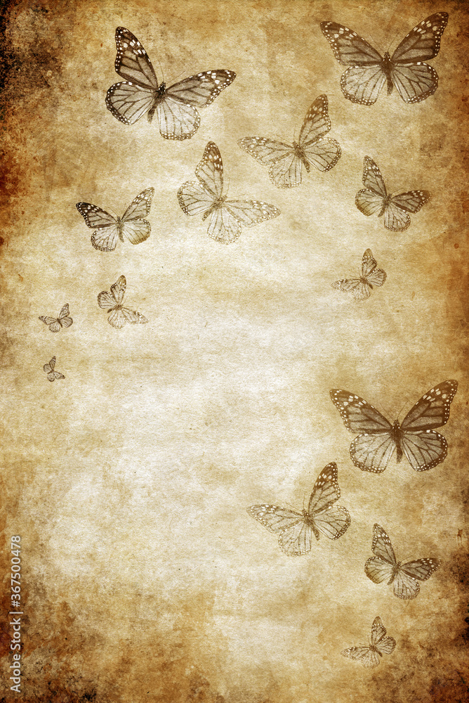 many butterflies over old brown paper with grunge texture with copy ...
