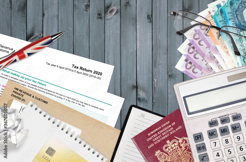 English form sa100 Tax return by HM revenue and customs lies on table ...