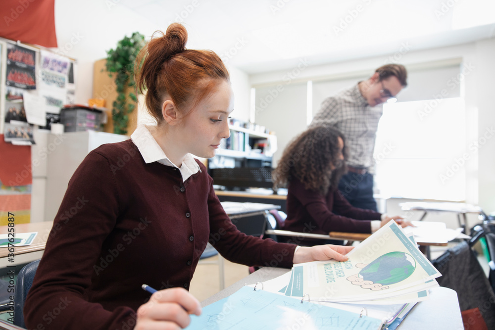 High school girl student studying in classroom Stock Photo | Adobe Stock