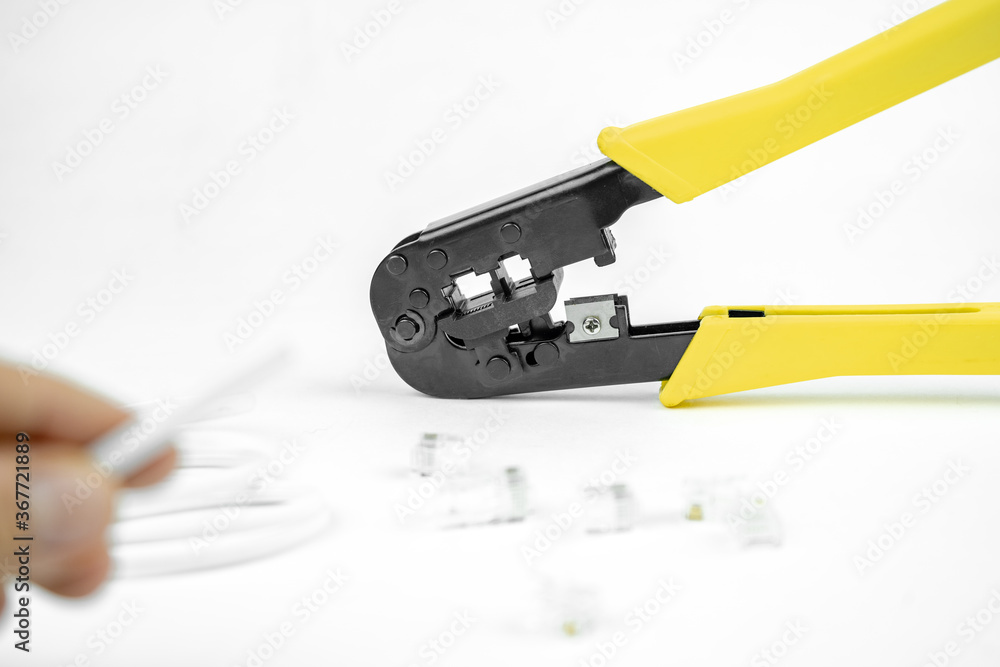 Fotografia do Stock: internet or telephone line cables and crimper ...