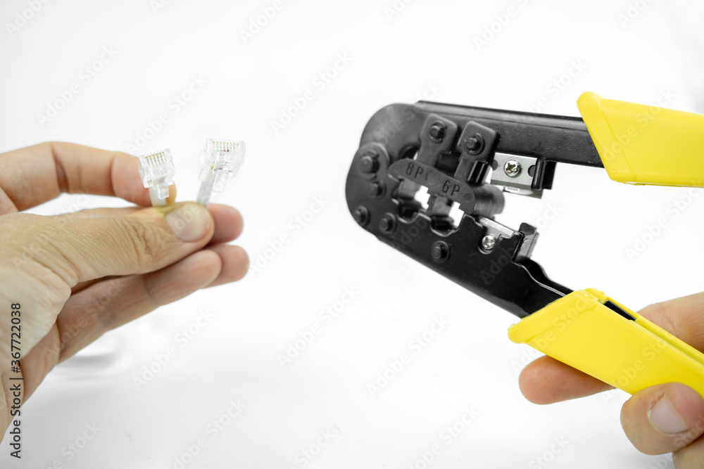 internet or telephone line cables and crimper, Twisting Cable Tool ...