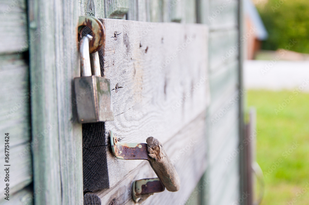 The old lock was used to lock old wooden doors. The steel silver lock ...