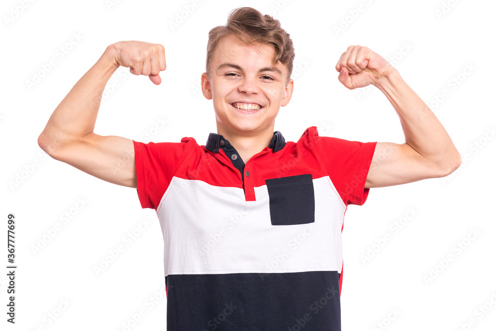 Portrait of funny teen boy raised his hands and shows biceps, isolated ...