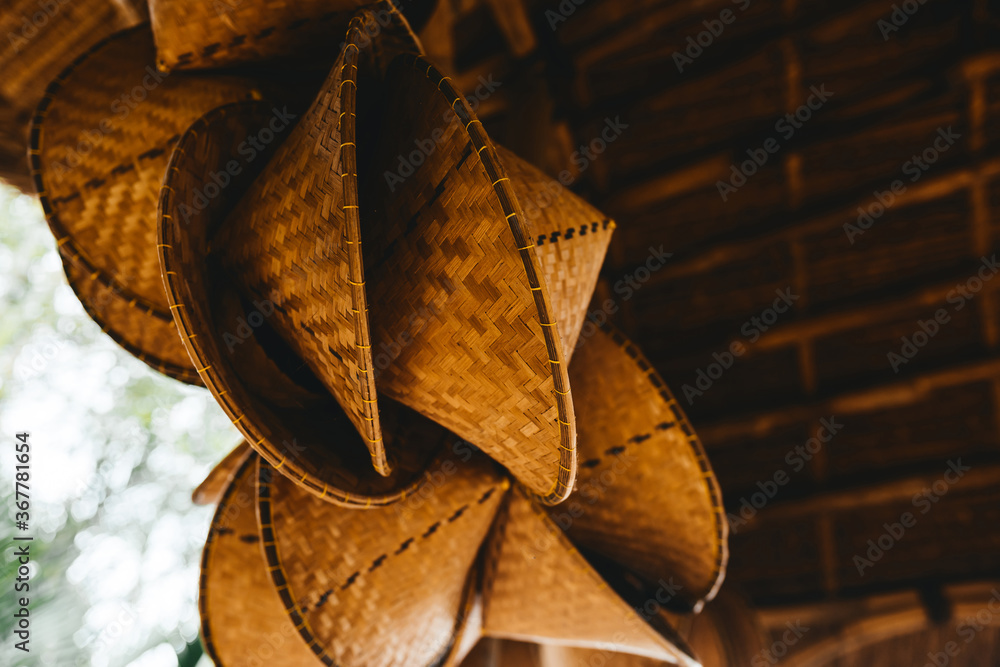 Traditional bamboo hat in a conical shape. In Asia these hats are often ...
