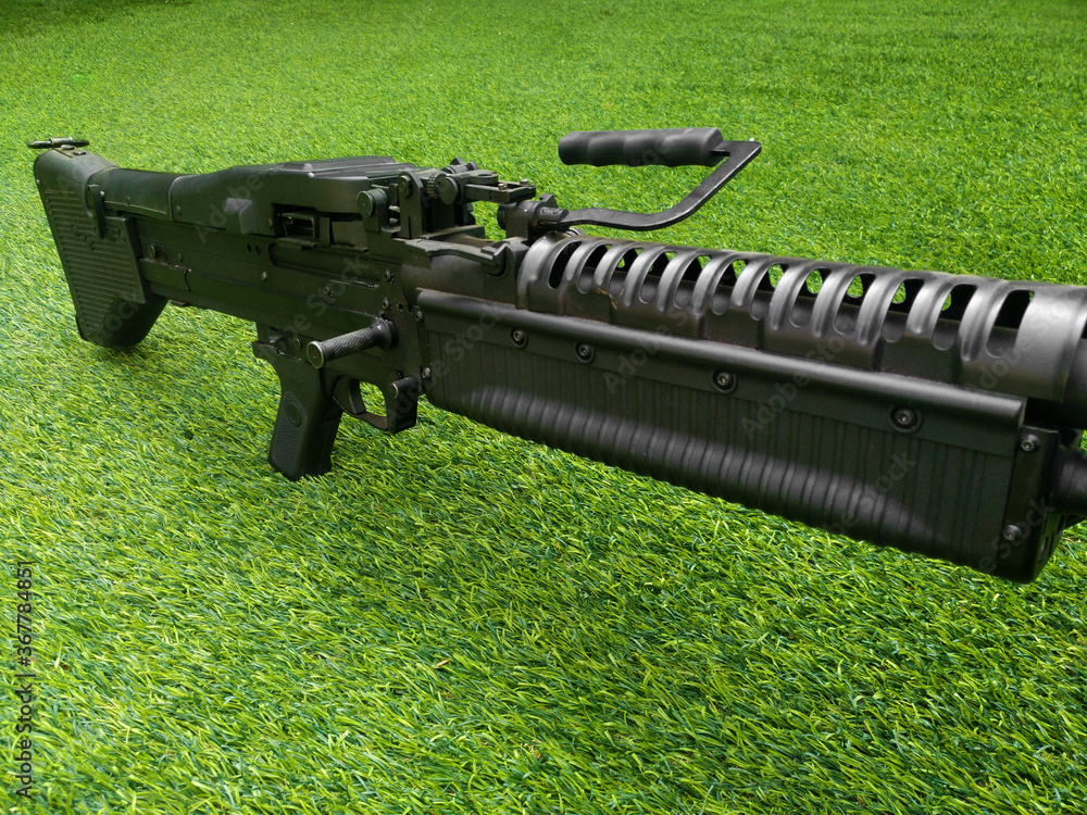 M60 military light machine gun with bipod weapon Stock Photo | Adobe Stock