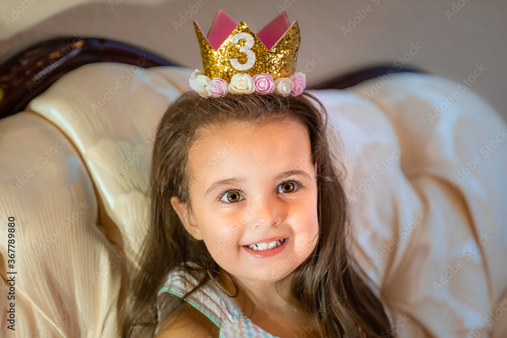 3 year old cute birthday girl with a birthday crown on her head Stock ...
