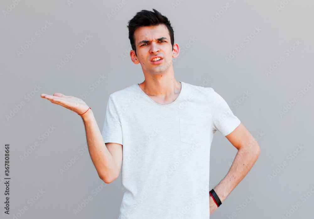 Stockfoto med beskrivningen Wtf this emoji mean. Confused gloomy and ...