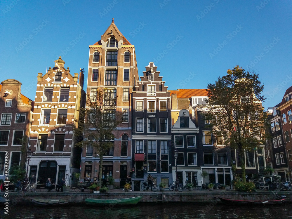 Singular architecture of Amsterdam, the most famous city of Netherlands ...