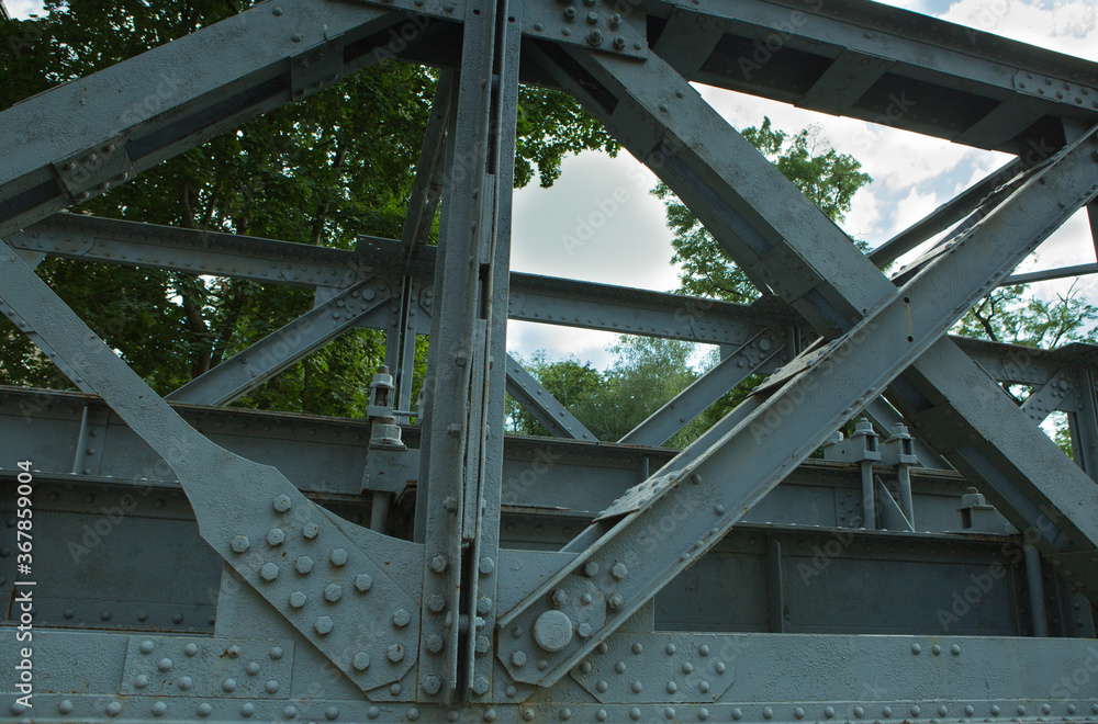 The old railway bridge. Steel structure truss assembly. Built in the ...
