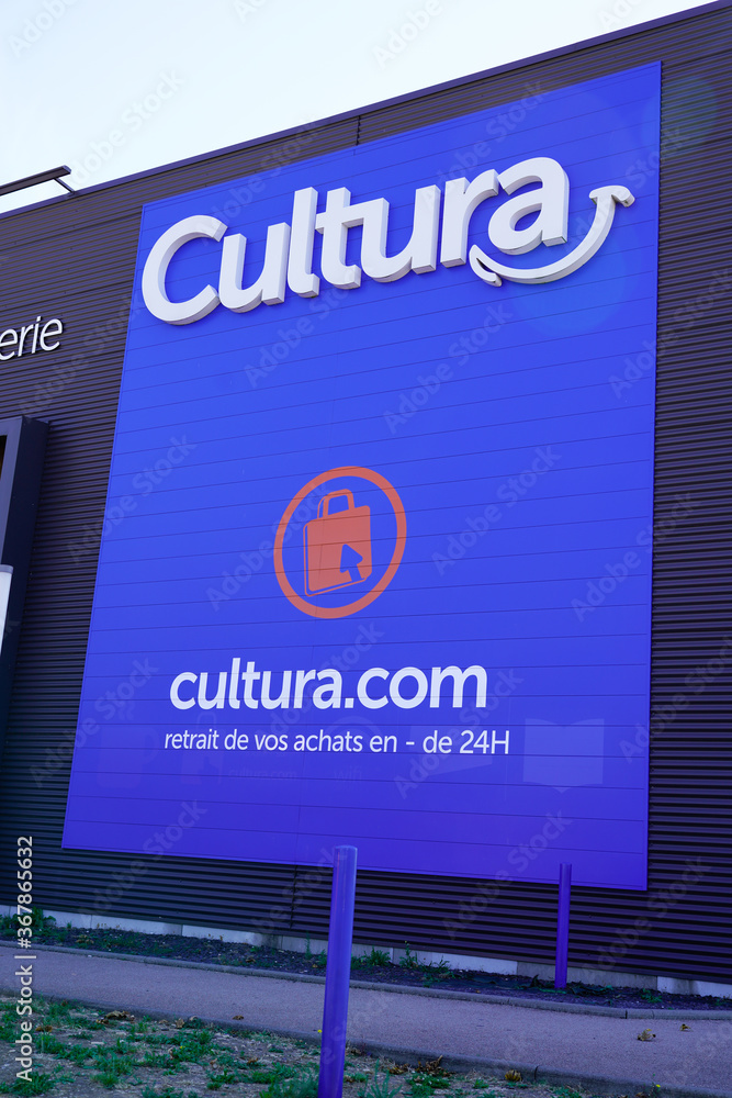 cultura text logo and sign cultura.com on shop advertisement building ...