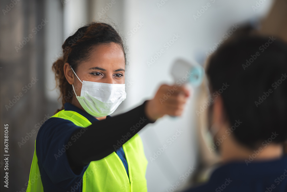Health check factory personnel using medical digital temperature ...