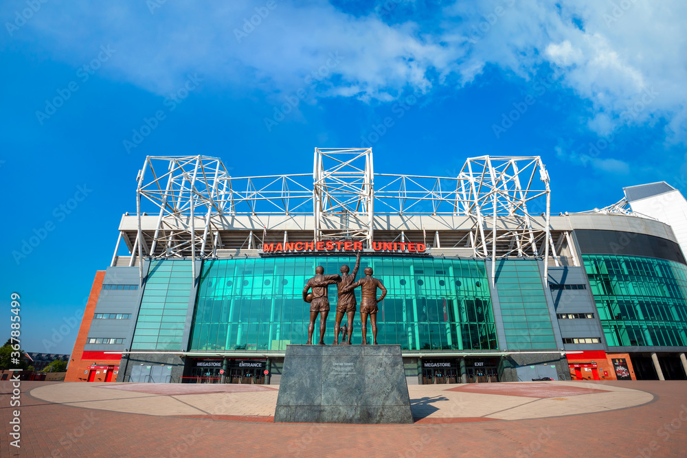 Manchester, UK - May 19 2018: The United Trinity bronze sculpture which ...
