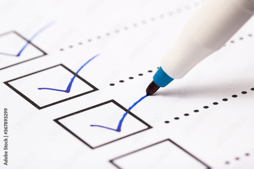 Check list and marker Stock Photo | Adobe Stock