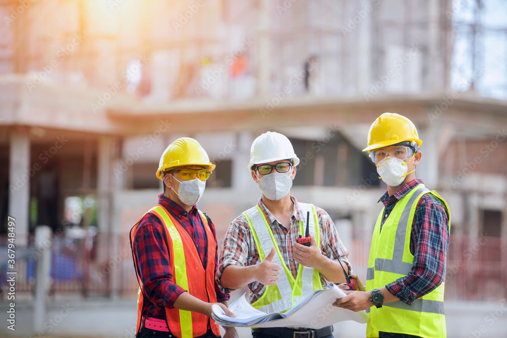Asian man civil engineer architect wearing safety helmet meeting at ...