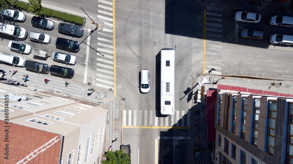Aerial view of the crosswalk and road junction between buildings at the ...