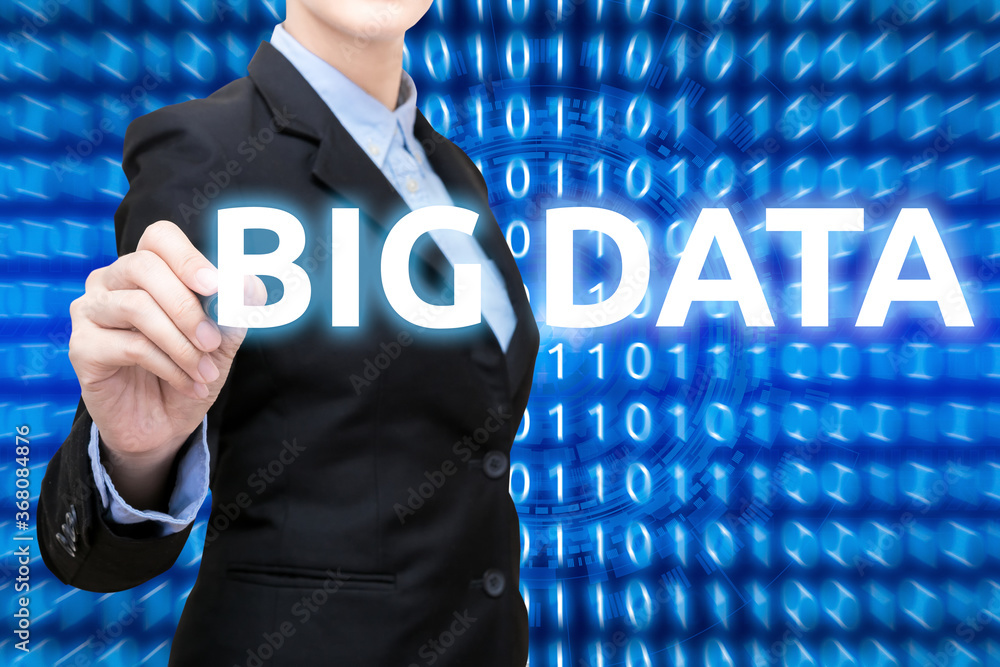 Smart business woman is writing big data with smart technology ...