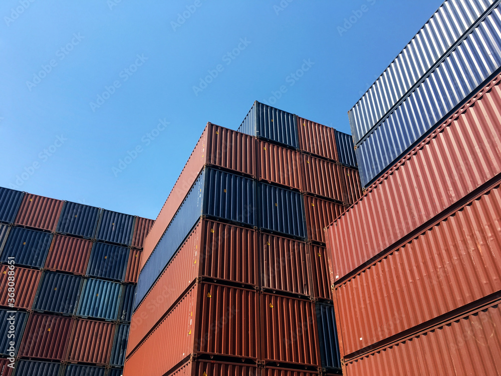 Colourful stack pattern of cargo shipping containers in shipping yard ...