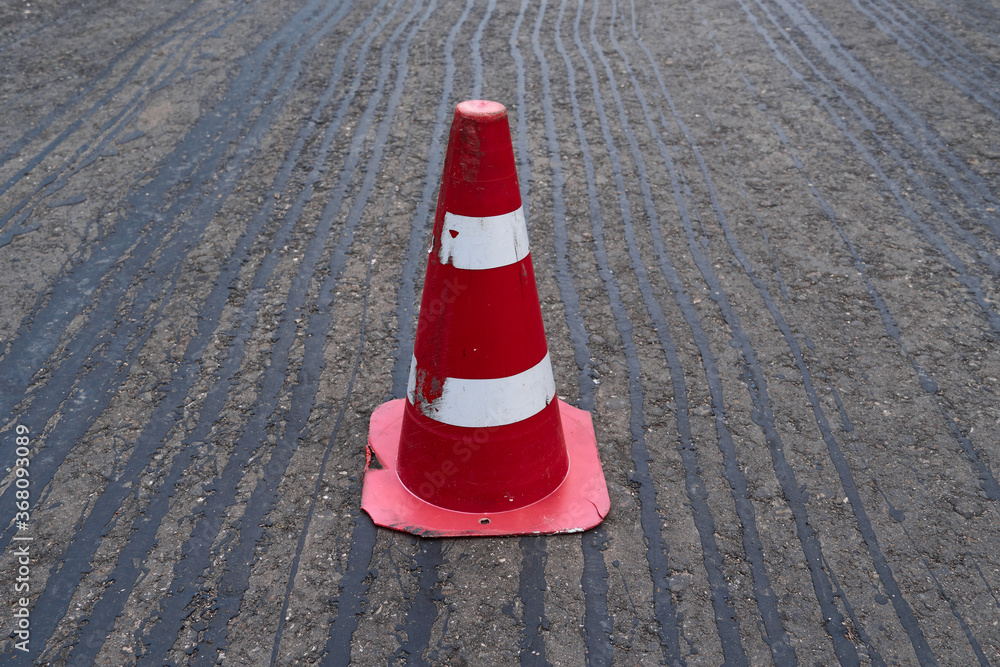 road construction or repair - laying a new layer of asphalt, marking ...