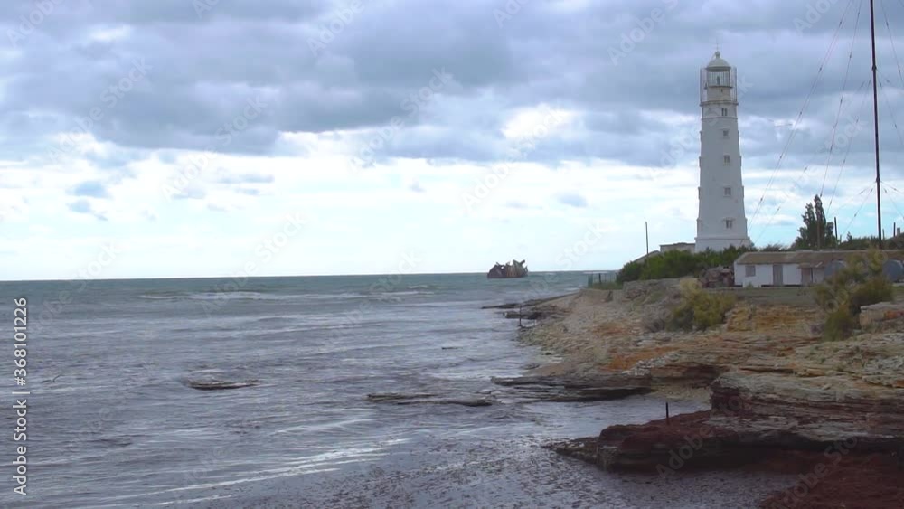 Beacon storm, day in the sea, summer on a rocky promontory. Tarkhankut ...