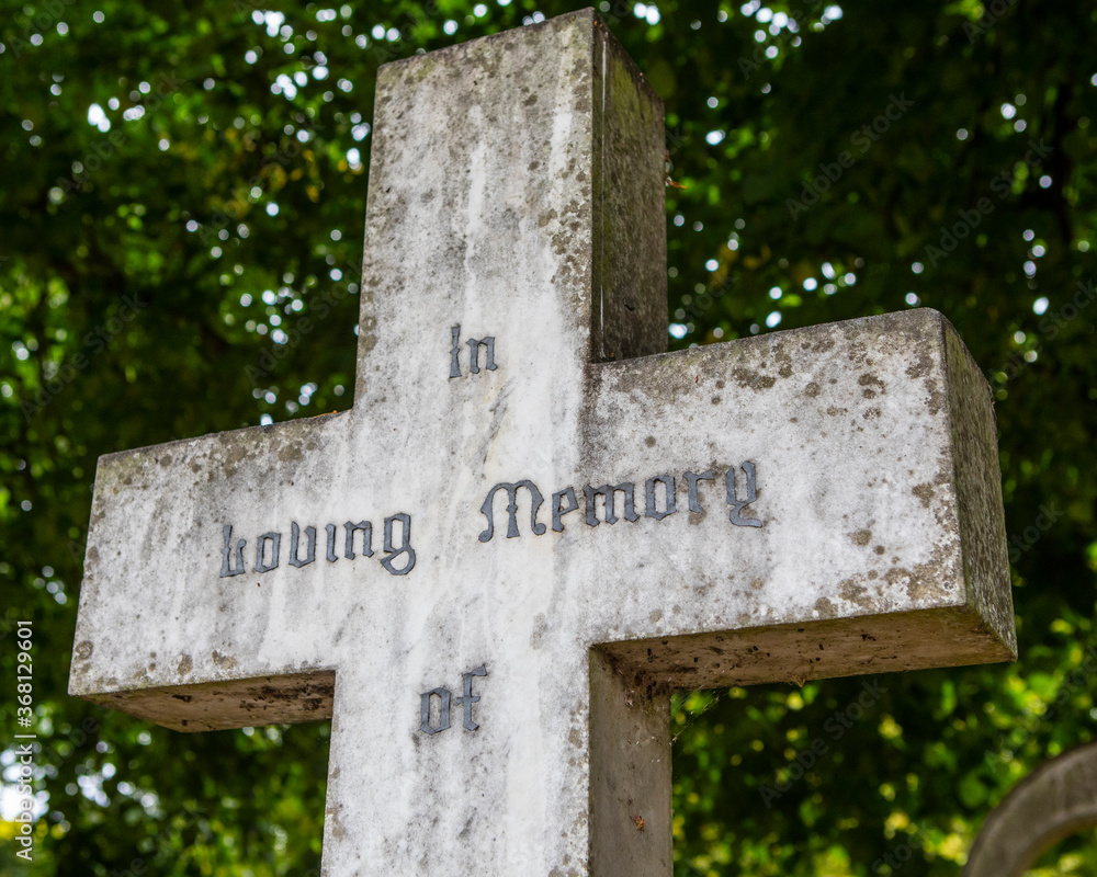 In Loving Memory of - on a headstone. Stock Photo | Adobe Stock