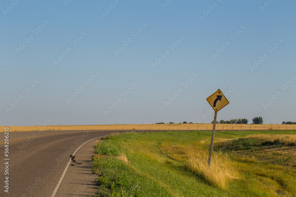 Traffic Signs Right Curve Road Warning and a bend in the highway road ...