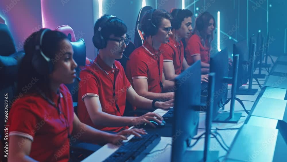 Diverse Esport Team of Pro Gamers Play in Video Game on a Championship ...