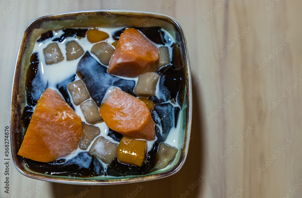 Traditional taiwanese iced dessert with Grass jelly, Taro balls, Tofu ...
