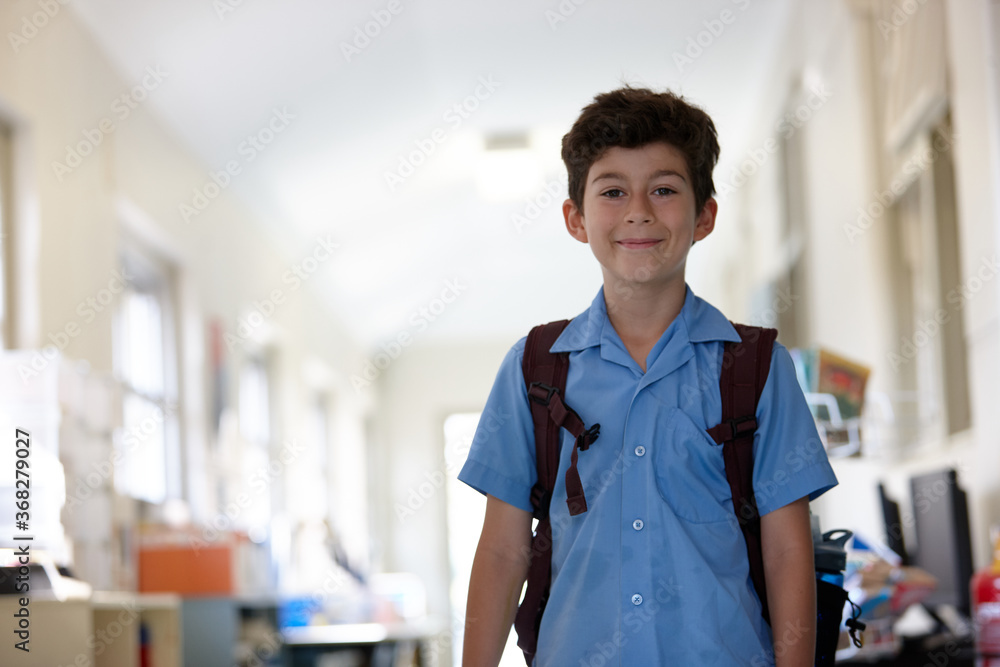 Young school boy at school Stock Photo | Adobe Stock
