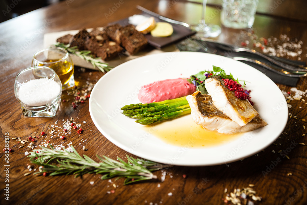 Pike-perch fillet. Asparagus, pearl couscous, white wine sauce, beet ...
