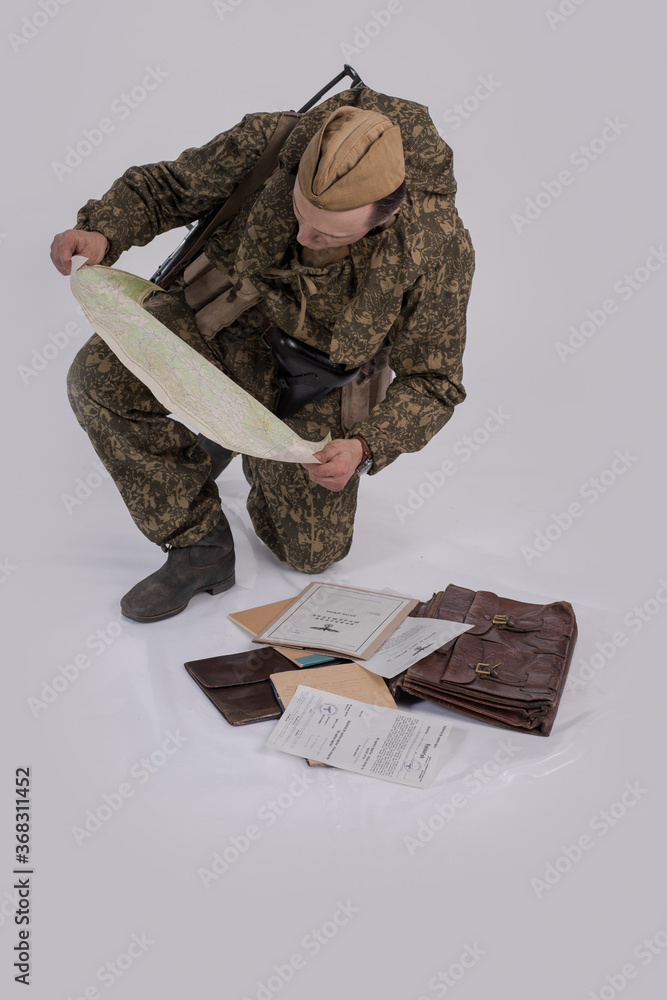 A male actor in the historical uniform of an officer of an army ...