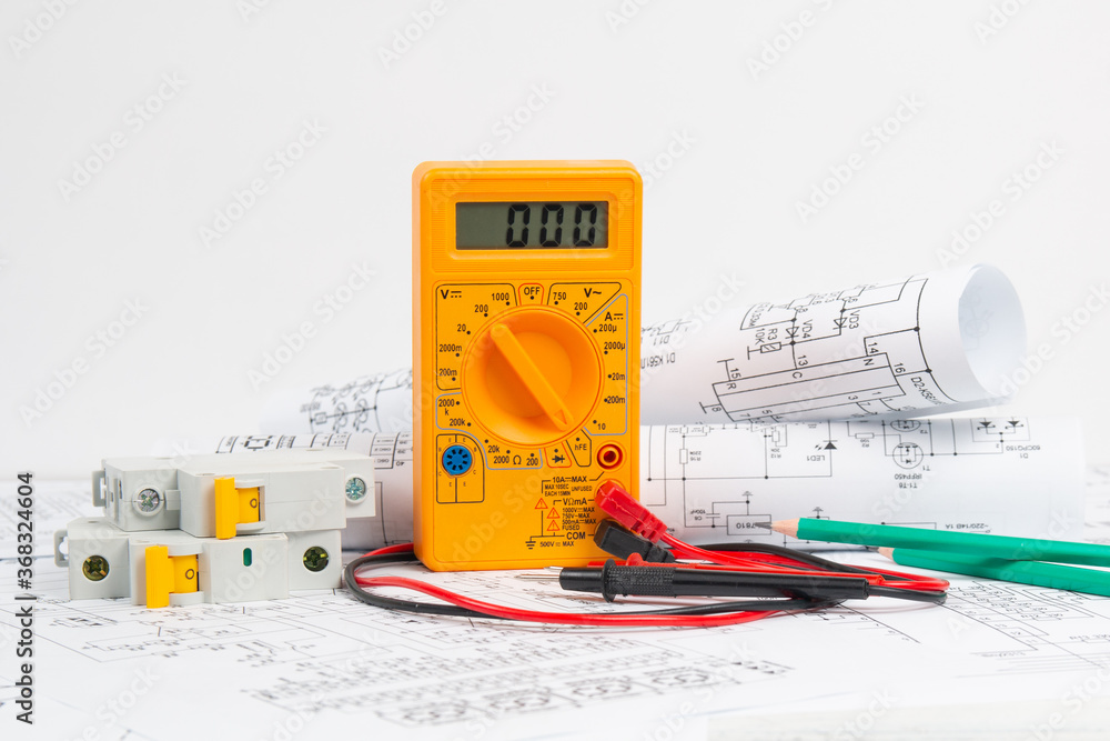 electrical engineering drawings, circuit breaker, pencils and digital ...