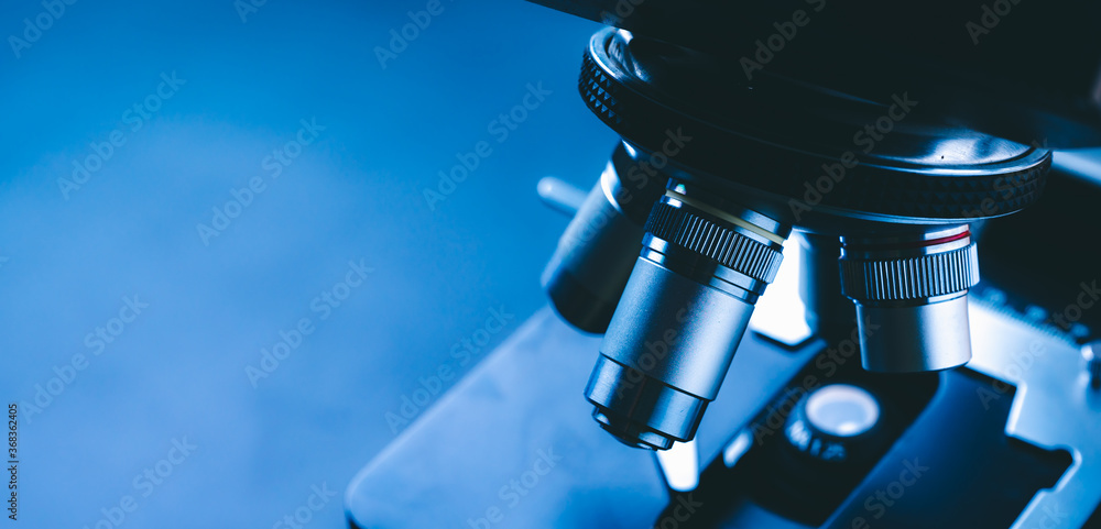 Foto de Laboratory equipment optical microscope, closeup of scientific ...