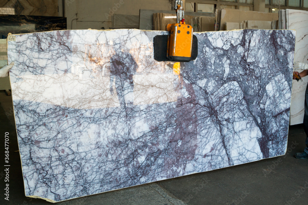 Displaying a Colorful marble slab in the store showroom before selling ...