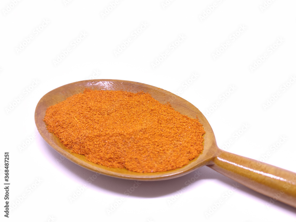 Wooden spoon of red chili powder isolated on white background. Chili ...