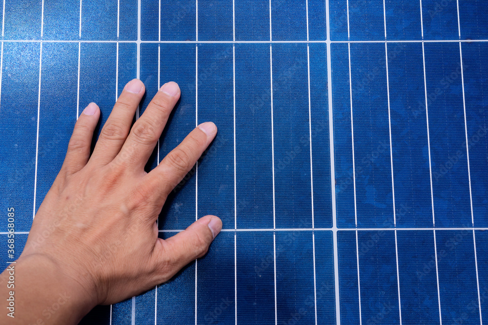 The hand is touching the Photovoltaics, Solar power, clean energy Stock ...