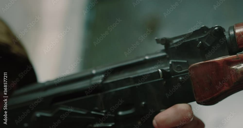 removal from safety lock, assault rifle, reloading and a finger on the ...