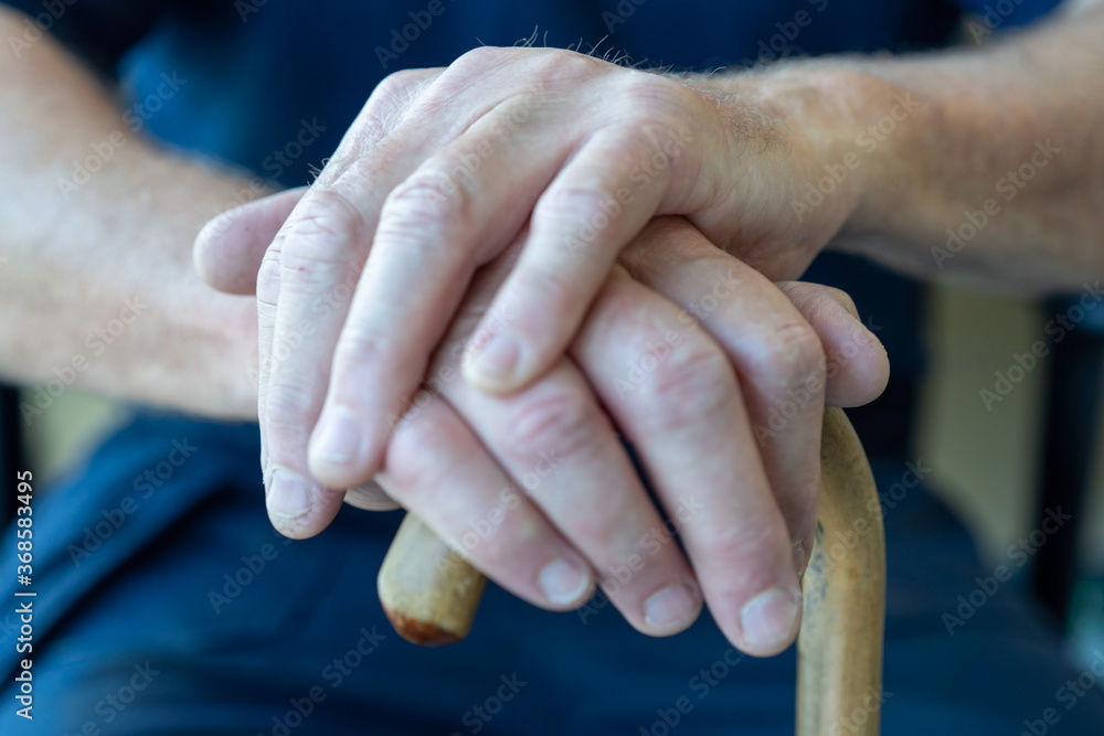 Old man hands on walking stick. senior man holding a cane. senior man ...