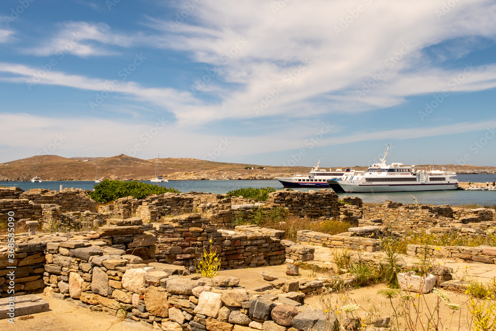 DELOS, Greece. View of a bay on Delos Island, Greece, with tourist ...