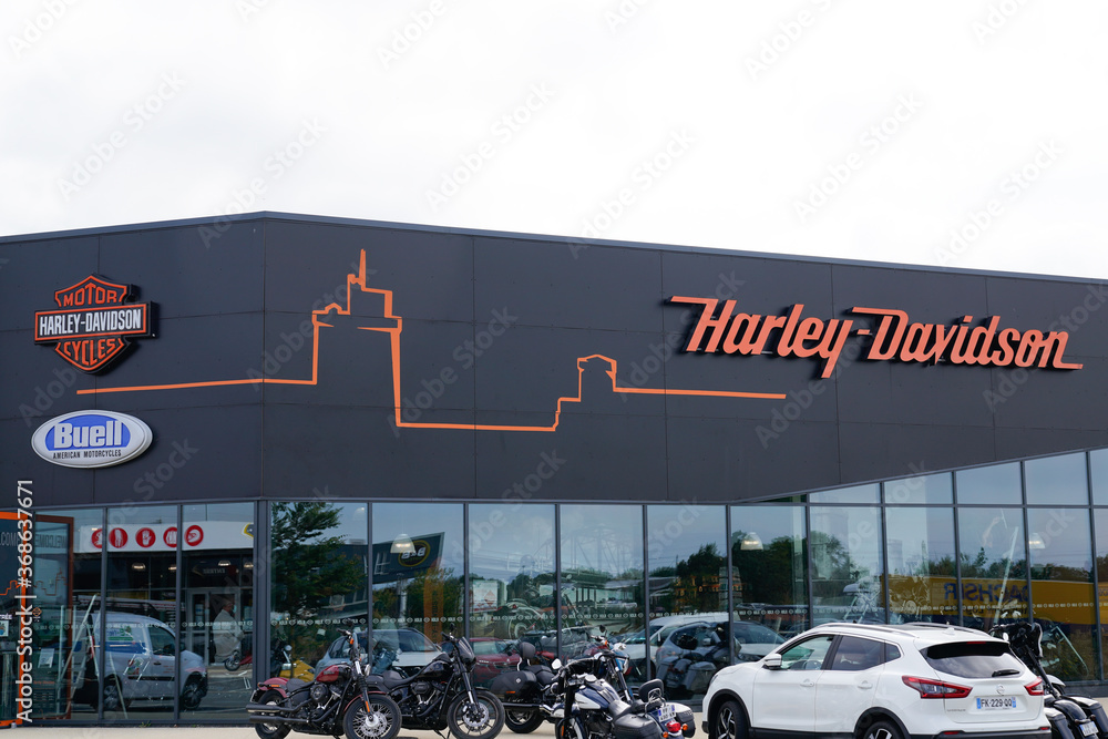 Harley Davidson logo and text sign on shop retailer facade of ...