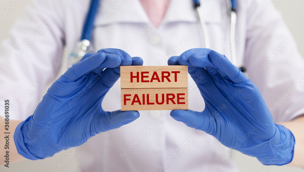 Heart failure concept. HEART FAILURE words inscription on wooden blocks ...