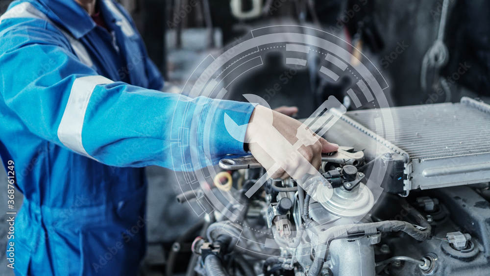 Mechanic auto mechanic in uniform repairing.car in auto machine tools ...