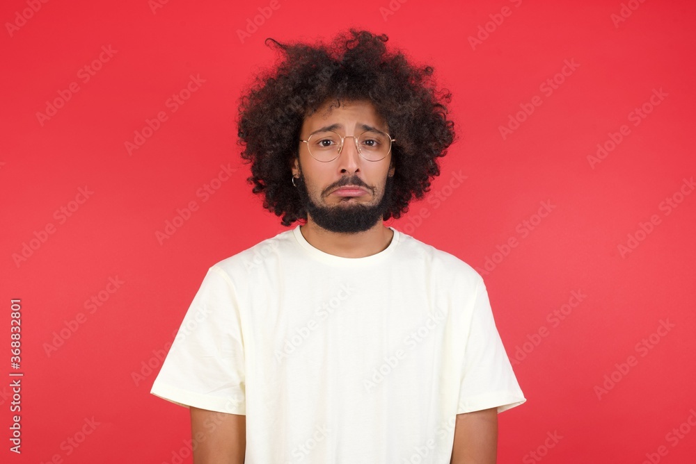 Beautiful face of sad man crying desperate and depressed with tears on ...